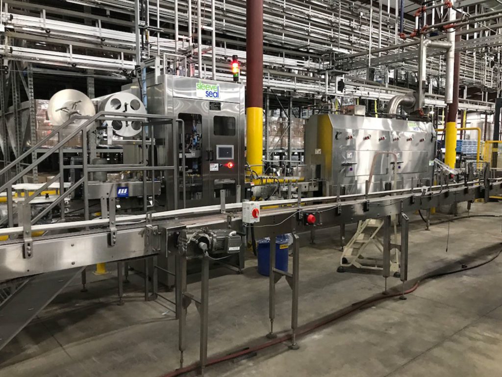 Used High Speed Sleeve Labeler with Steam Tunnel | Sourceline Machinery